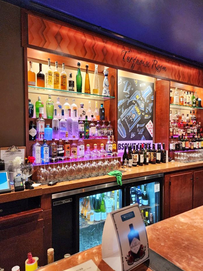 A bar stocked for serious enjoyment, where the bottles glow like jewels. The Turquoise Room takes its liquid refreshment as seriously as its food.