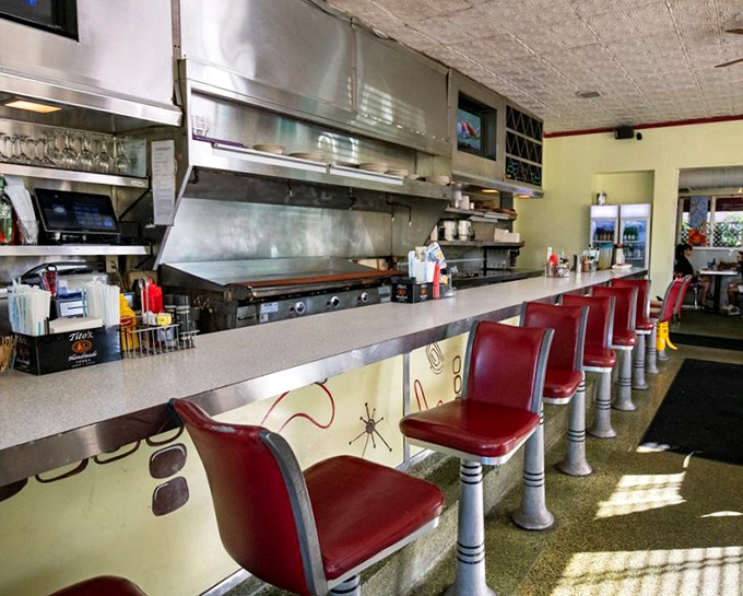 The bar area where locals gather for honest drinks and even more honest conversations.