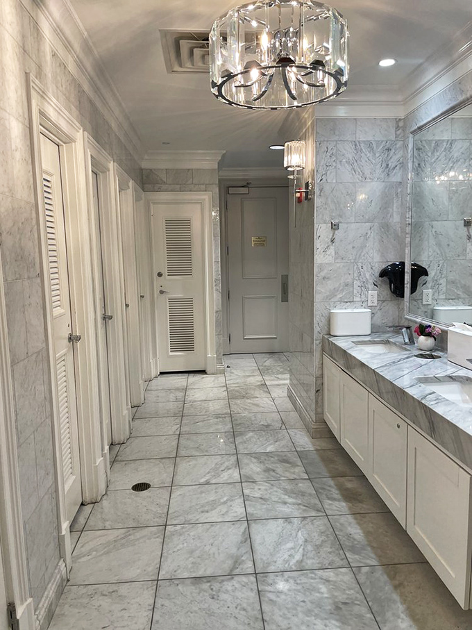 Even the restrooms at Frankie's maintain the elegant marble aesthetic. Powder room or Roman bath? You decide.