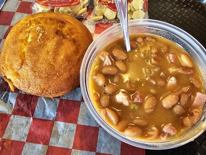 Baked beans that have clearly been introduced to their meaty neighbors before serving. This isn't just bean soup&mdash;it's a pork-infused revelation.