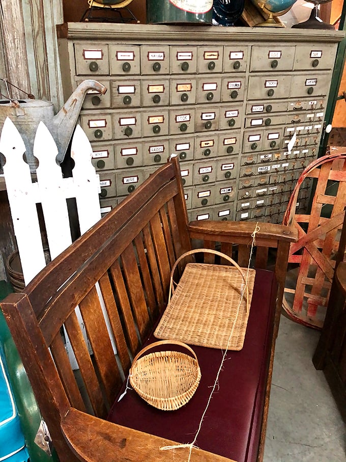 A vintage bench sits before an old card catalog &ndash; two relics from when "browsing" meant physically moving through a space.