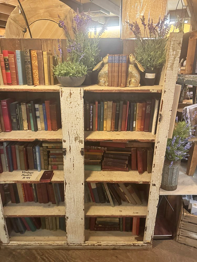 Vintage books and lavender create a vignette straight out of a countryside dream, with rabbit bookends standing guard.