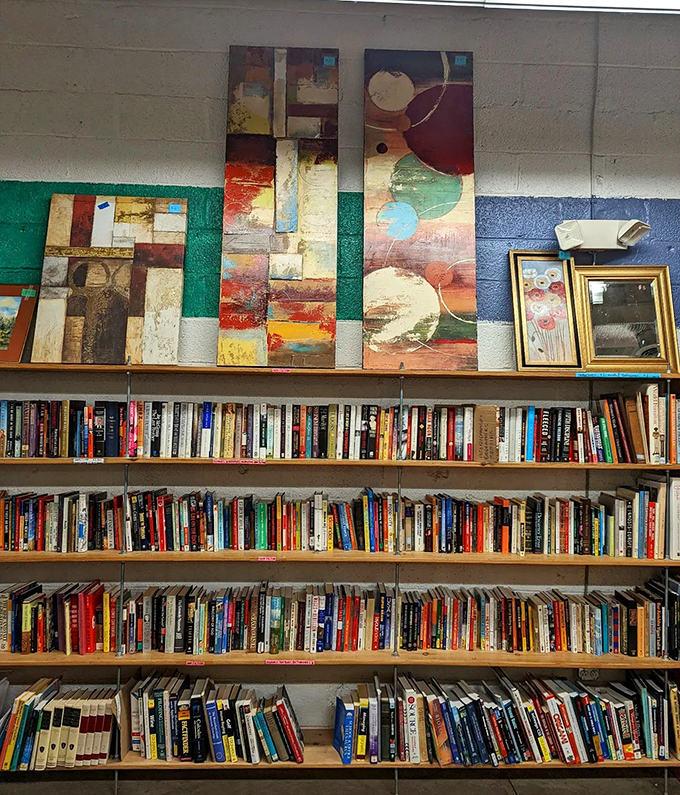 Literature lovers, rejoice! The book section offers everything from bestsellers to obscure titles, with unexpected art displayed above the well-organized shelves.