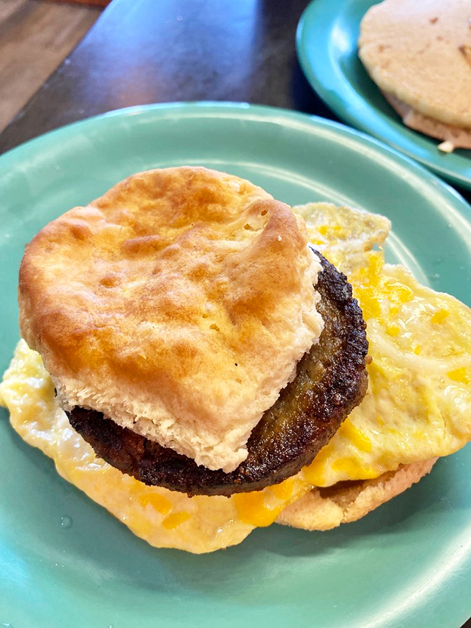 A biscuit sandwich that says, "Sure, eat me with your hands if you want, but you'll be reaching for that fork eventually."