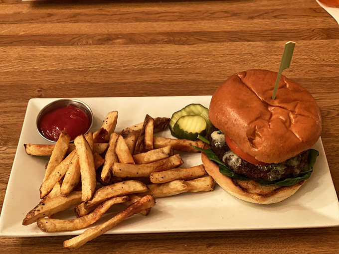 A burger that doesn't try to reinvent the wheel—it just makes the wheel absolutely perfect. Those fries look like they're auditioning for a food commercial.