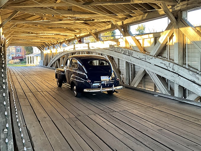 Classic cars crossing historic bridges create moments when past and present shake hands like old friends.