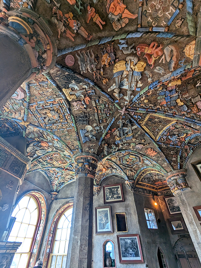Look up! This ceiling tells more stories than Netflix, with handcrafted tiles creating a narrative tapestry that predates binge-watching by a century.