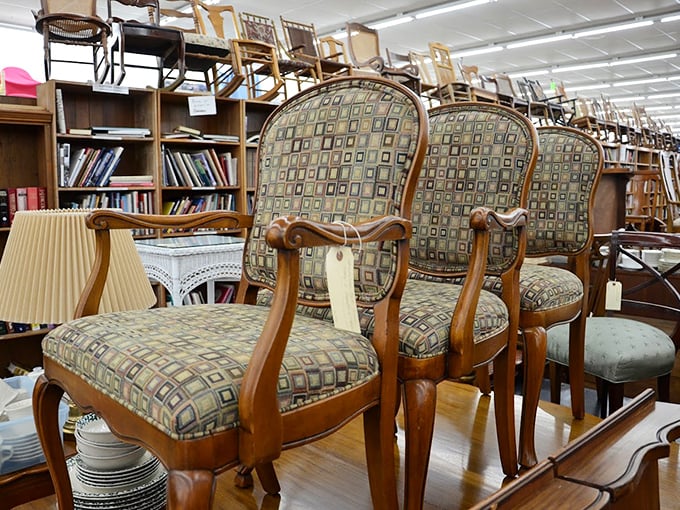 These distinguished armchairs aren't just furniture; they're time machines upholstered in 1970s geometric patterns, waiting to transport you back to grandma's living room.