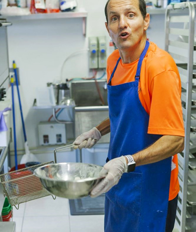 Behind every great seafood dish is someone who knows exactly what they're doing. That look says, "Trust me, I've got this."
