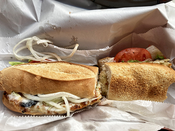 Two halves of sandwich perfection revealing layers of flavor that tell a more compelling story than most Hollywood blockbusters.