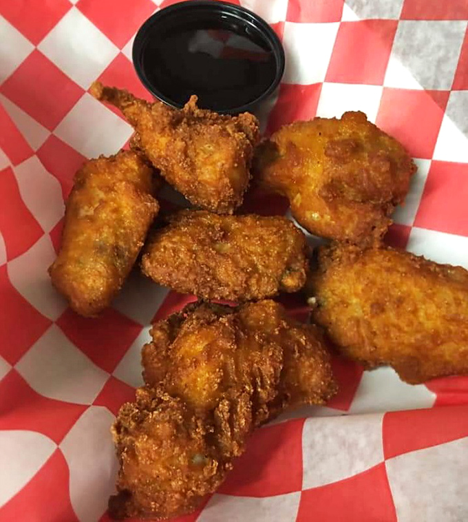 Golden-fried chicken wings that crunch louder than your New Year's resolutions breaking. Worth every napkin you'll need.