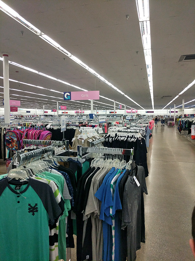 Racks upon racks of possibilities. The clothing section stretches toward the horizon like a textile ocean. 