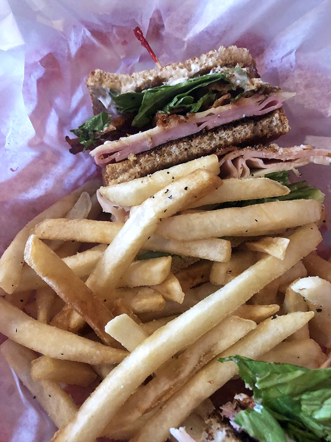 A sandwich with perfect layering architecture&mdash;the structural engineering degree of the food world. Every bite delivers the perfect ratio of ingredients.