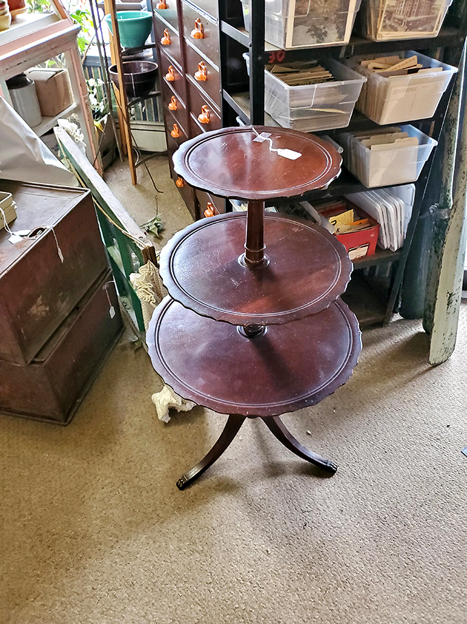This three-tiered mahogany table has hosted more tea parties than the Mad Hatter. Just imagine the gossip it's witnessed.