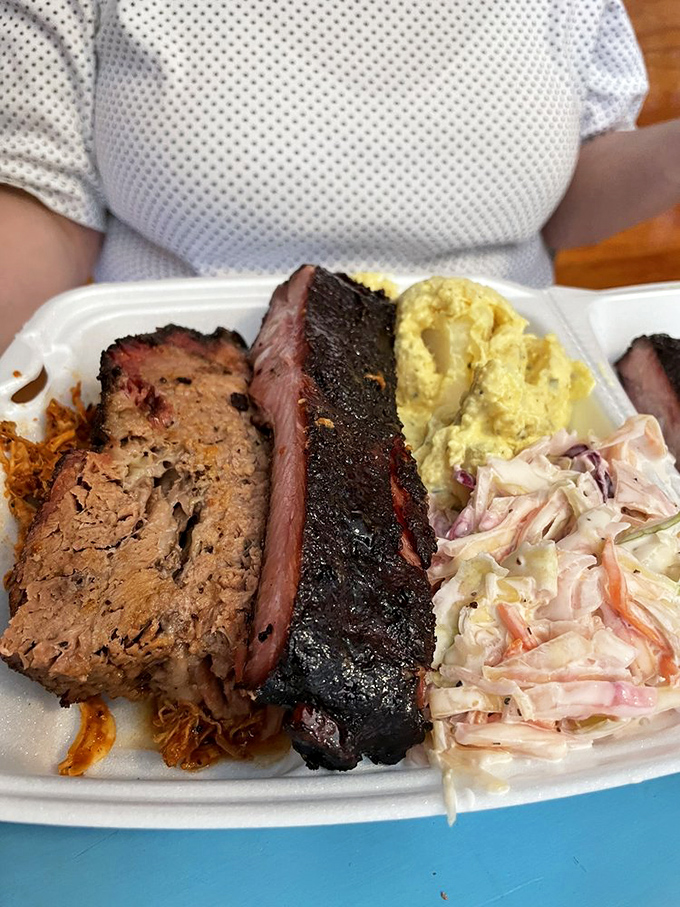 This isn't just a meal&mdash;it's a meat festival featuring the headliners of barbecue excellence with sides that refuse to be mere opening acts.