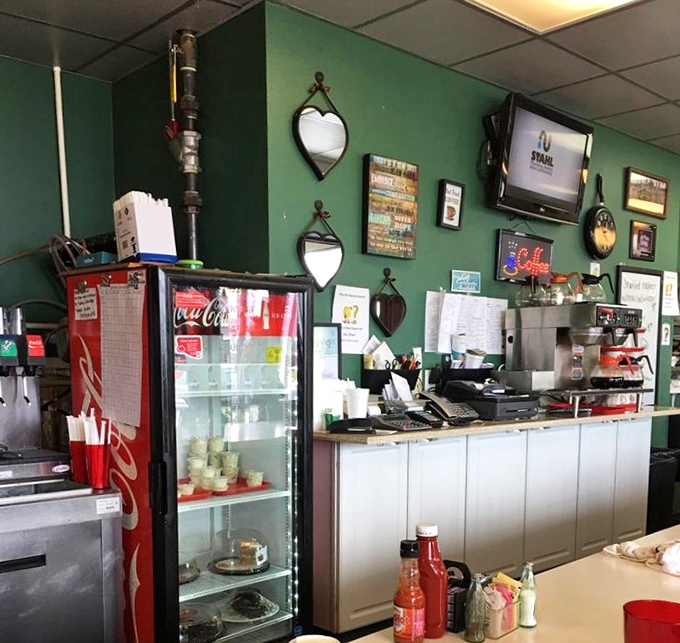 The heart of any great diner: a counter where regulars perch, condiments stand ready, and the day's first conversations begin brewing.