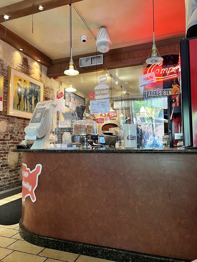 The counter at Campo's &ndash; where sandwich dreams become reality. That neon sign glows like a beacon of hope for the hungry.