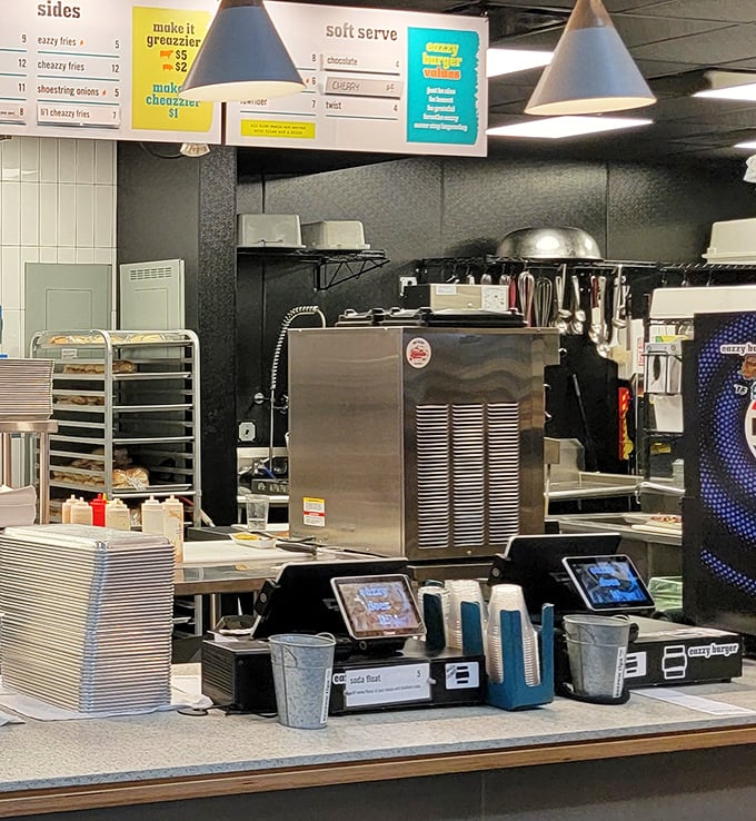 Those wood-grain tables aren't just furniture &ndash; they're the stage where burger magic meets comfortable dining in perfect harmony.