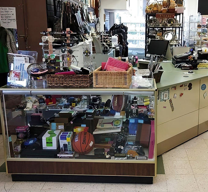 Command central, where treasures are priced and volunteers reign. The heart of the thrifting operation beats behind this counter.