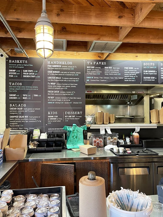 Where the magic happens. The open kitchen and menu board promise seafood treasures prepared simply and honestly, just as they should be.