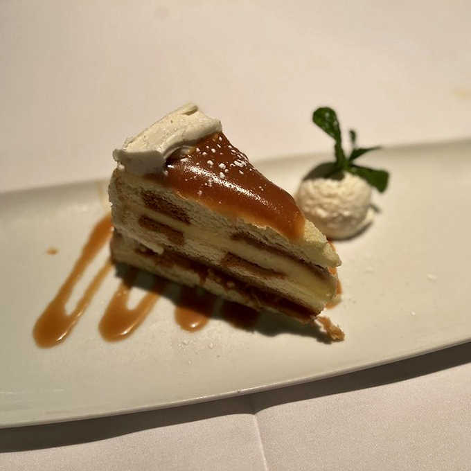Layers of delicate cake, cream, and caramel that don't so much end a meal as provide a standing ovation for it.
