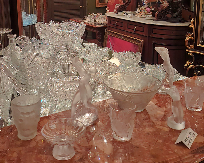 A symphony in crystal – from frosted figurines to cut glass bowls, each piece catching light in its own unique conversation with sunshine.