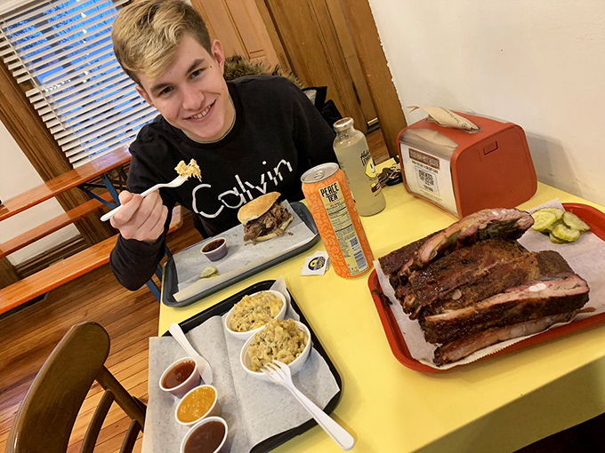 Pure barbecue bliss captured in one satisfied smile &ndash; this is what food happiness looks like in action.