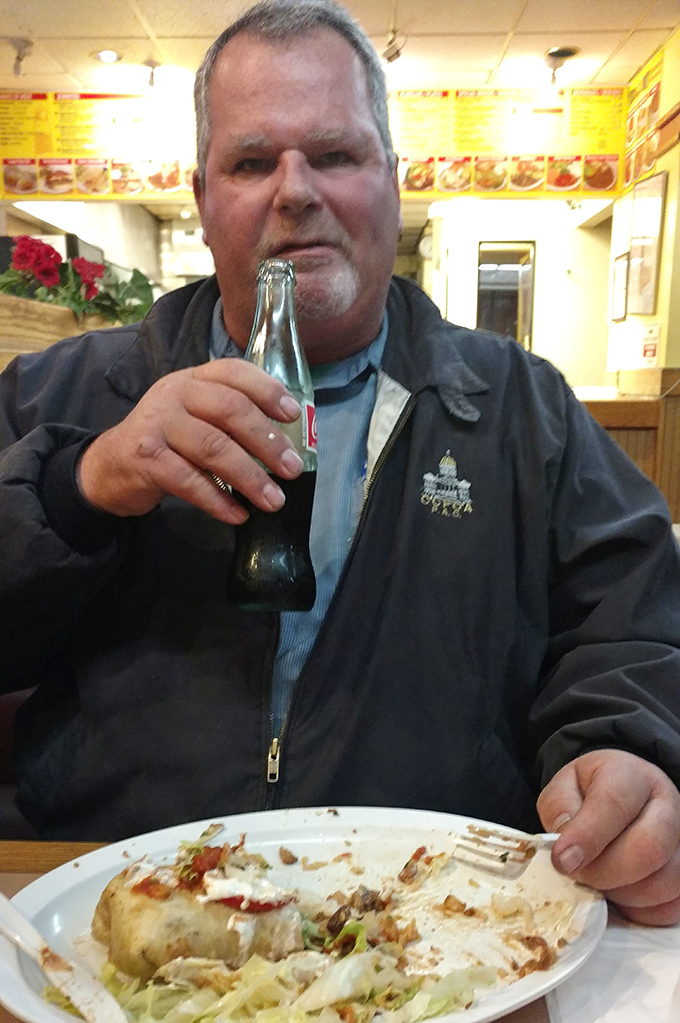 The universal expression of a satisfied customer. That empty plate tells the whole story better than words ever could.