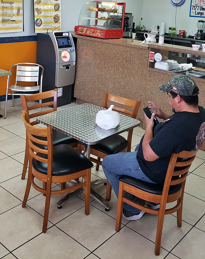 The no-frills setting lets you focus on what matters - the serious business of enjoying exceptional Cuban cuisine.