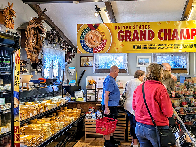 Customers on a pilgrimage to cheese heaven, baskets in hand, contemplating their next dairy-based life decision. The banner proclaims their destination's champions.