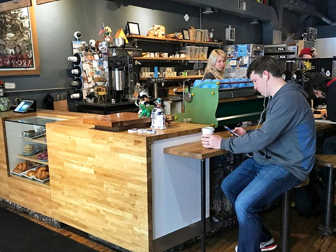 The counter service setup invites lingering, where baristas craft drinks with the precision of neurosurgeons and the flair of '80s rock stars.