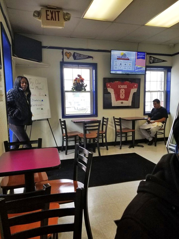 Where sandwich enthusiasts gather to worship at the altar of hoagie perfection. The framed jerseys speak to Lorenzo's deep community roots.
