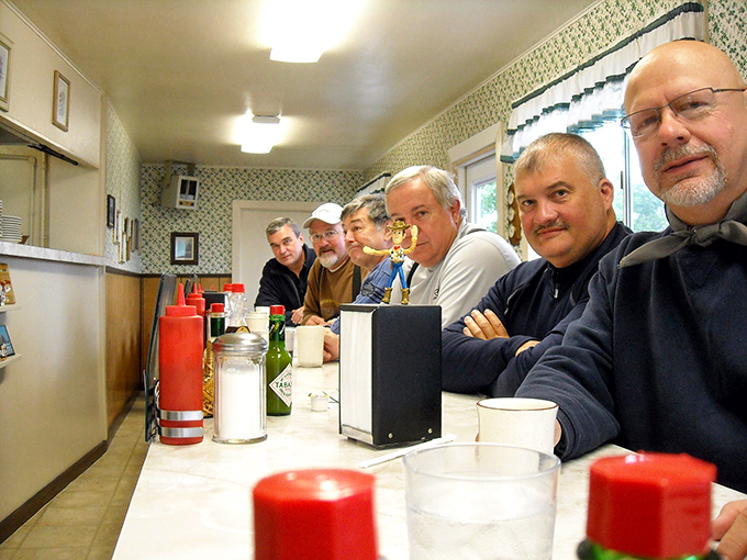 The counter crew solving world problems over coffee, just like diners have done since time immemorial.
