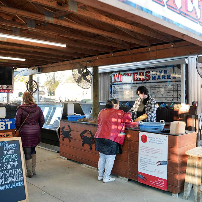 The seafood market counter&mdash;where relationships with your dinner begin. Those blue baskets hold the freshest catches of the day.