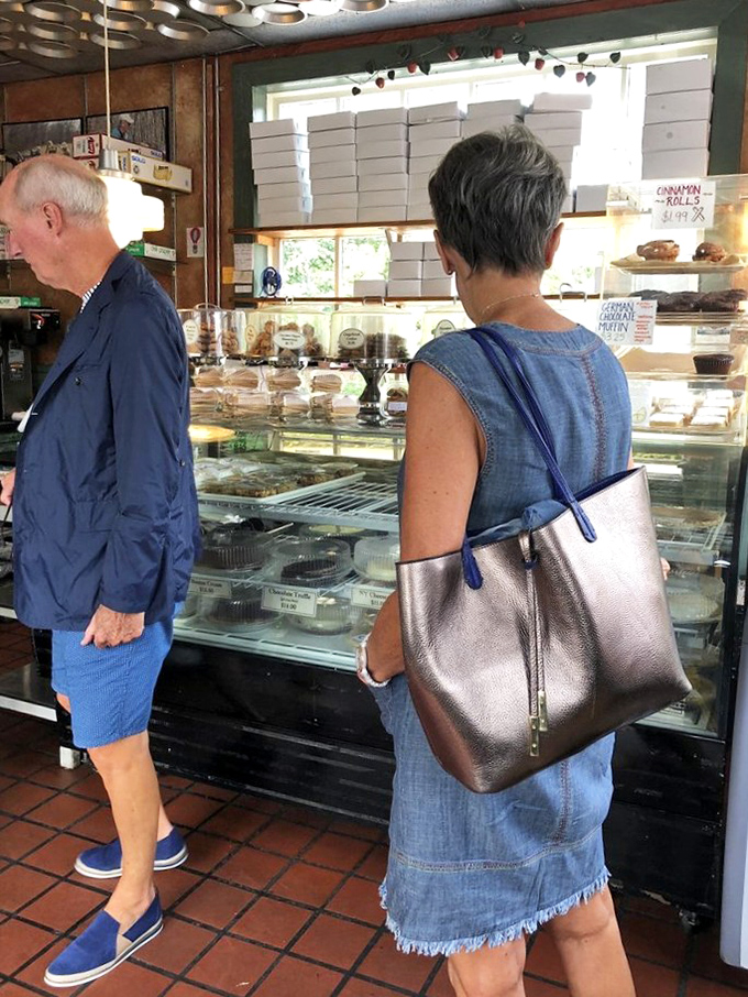 Happy customers savoring their selections prove that good pie creates instant community among complete strangers everywhere.