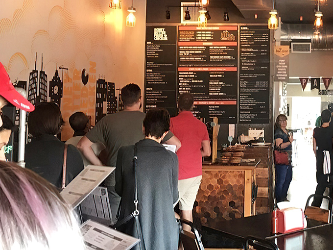 The line forms at the counter where Chicagoans patiently wait their turn, knowing that good things come to those willing to stand for great chicken.