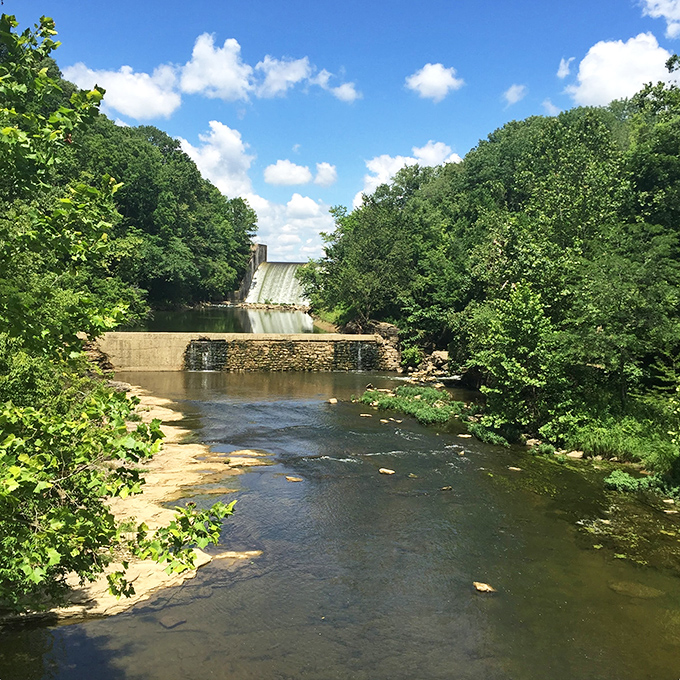 Where Rocky Fork Creek meets human ingenuity, creating a peaceful scene that belongs on the cover of "Relaxation Monthly."