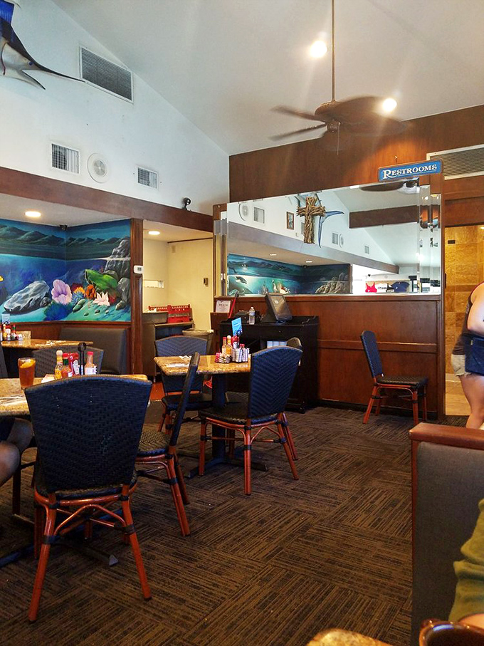 Coastal-themed murals transport you underwater while you're busy diving into your breakfast.