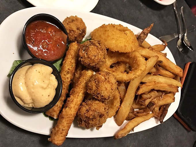The fried seafood platter that makes you wonder why anyone would ever order anything else. Golden perfection with dipping sauces for days.
