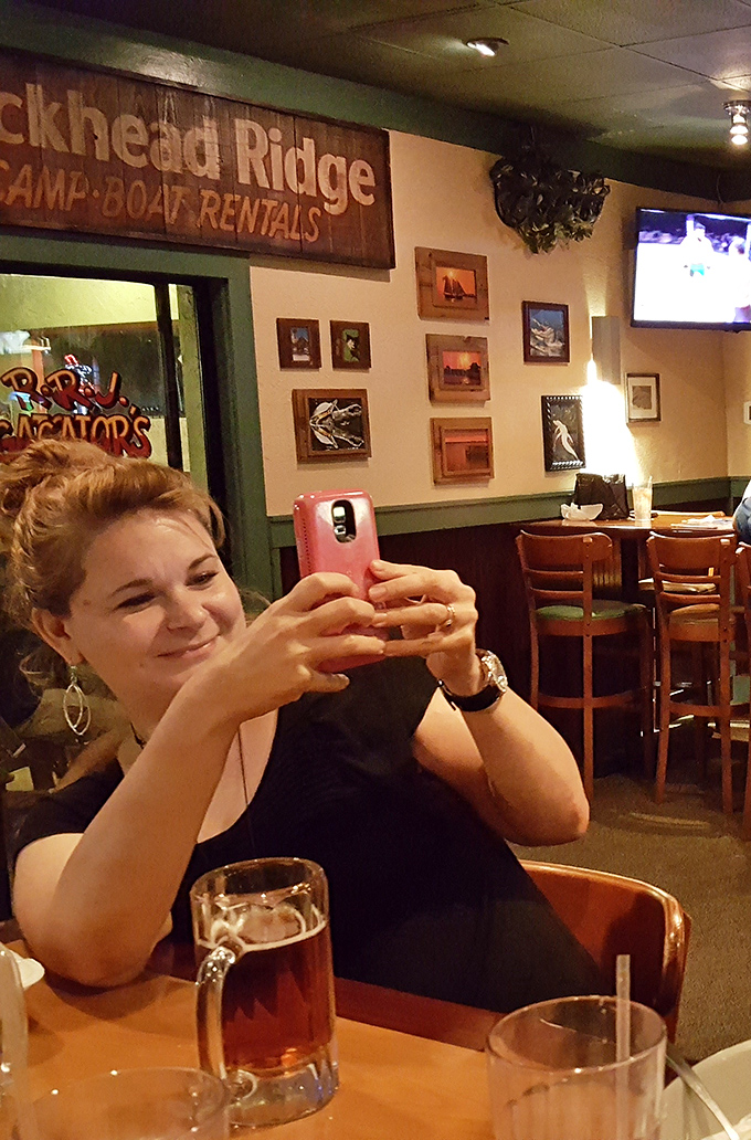 Where memories are made between sips of cold beer and bites of Florida fare. The wall d&eacute;cor silently judges your food choices.