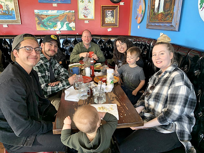 Happy diners sharing a meal and making memories. This is what restaurants are really about&mdash;bringing people together around good food.