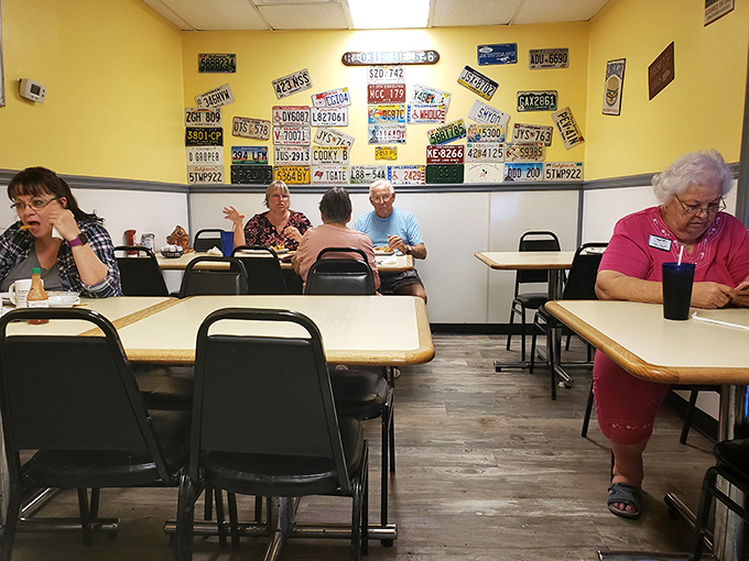The dining room wall showcases license plates from visitors far and wide&mdash;each one a testament to food worth traveling for.