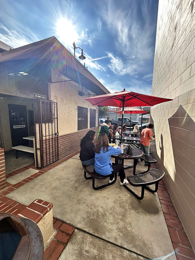 Sunshine, red umbrellas, and the promise of burritos&mdash;this patio scene is what California dreams are made of.
