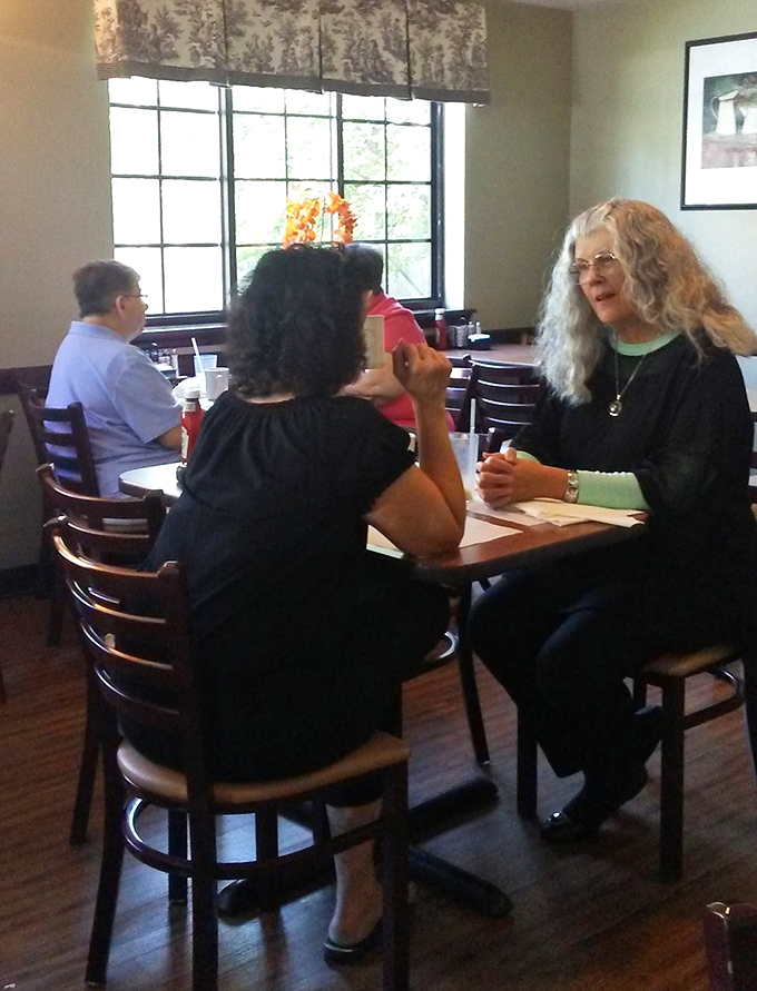 Breakfast conversations at Ida's&mdash;where coffee refills and friendly chatter flow with equal abundance and warmth.