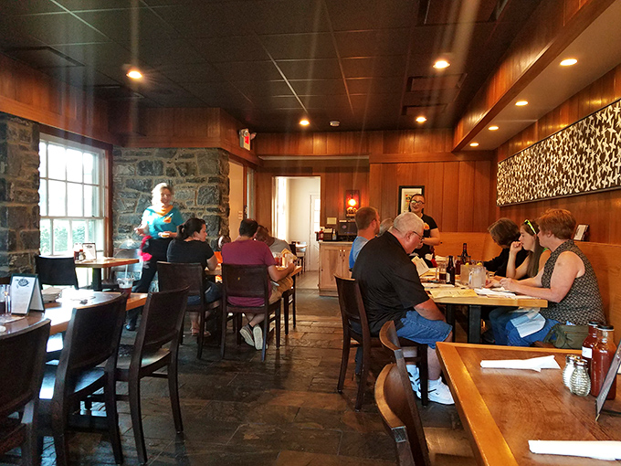 The dining room where strangers become friends, united by the universal language of "mmm" and "pass the napkins, please."