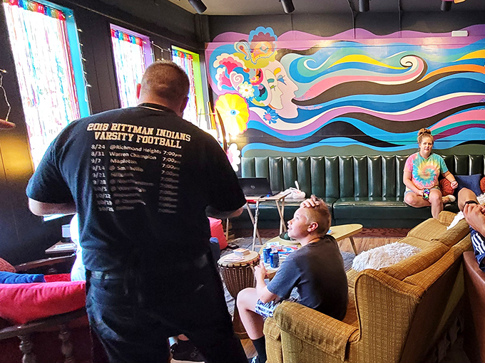 Locals gather in this technicolor dreamscape to share good food and conversation &ndash; proving great pizza brings people together across generations.