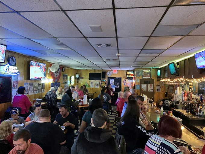 Where strangers become neighbors &ndash; the bar area buzzes with that magical energy that happens when good food brings people together.