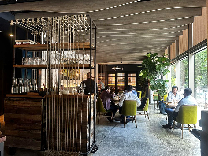The elegant dining room where business deals and anniversary celebrations happen side by side. Those lime chairs aren't just stylish—they're surprisingly comfortable.
