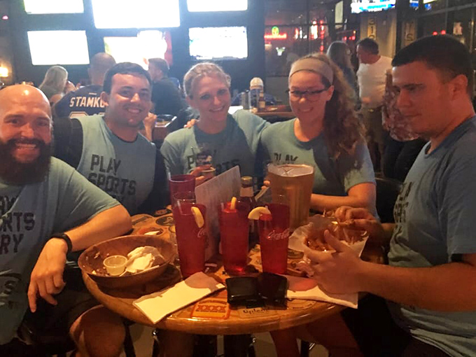Nothing says "local favorite" like matching team shirts and cold drinks. These folks aren't just customers; they're the tavern's unofficial ambassadors.