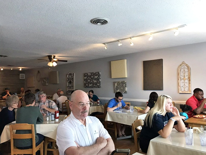 A snapshot of breakfast democracy in action - where strangers become temporary family, united by the universal language of good food.